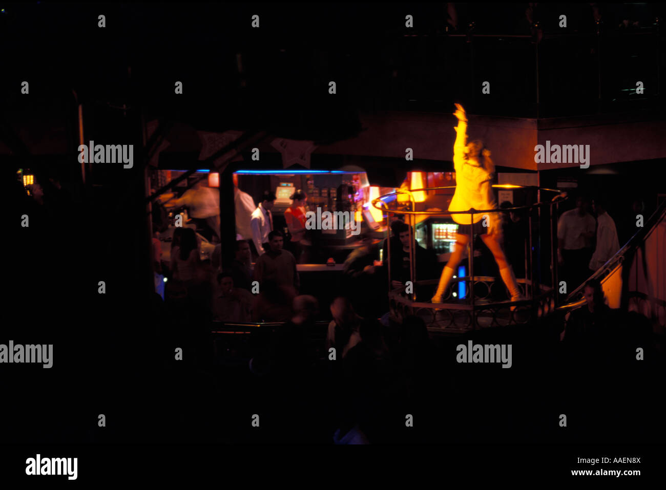 Go go girl dancing on stage Exquinox Nightclub Soho London London ...