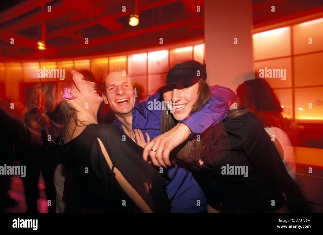 Man with two young women CC Club Nightclub Soho London London England ...