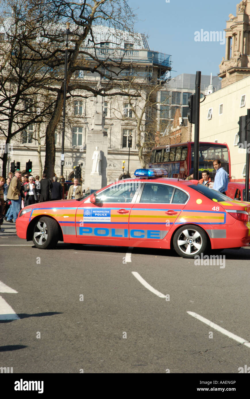 Red police car positioned across road in busy London West End Stock ...