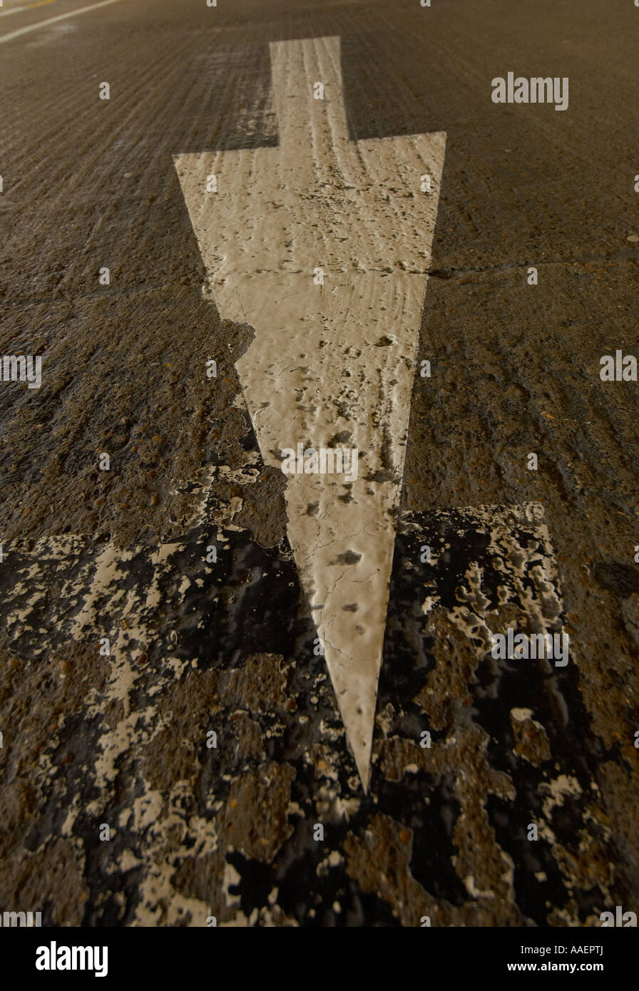 Directional arrow on ground in car park Stock Photo - Alamy
