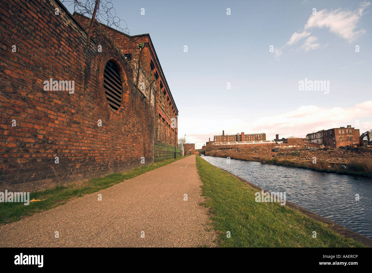 Derelict mill on Ashton Canal, Old Mill Street, Ancoats, Manchester, UK ...