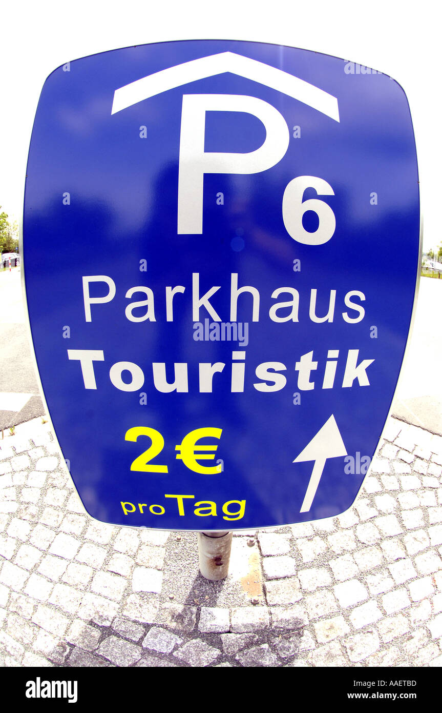 parking signpost sign blue white Stock Photo - Alamy