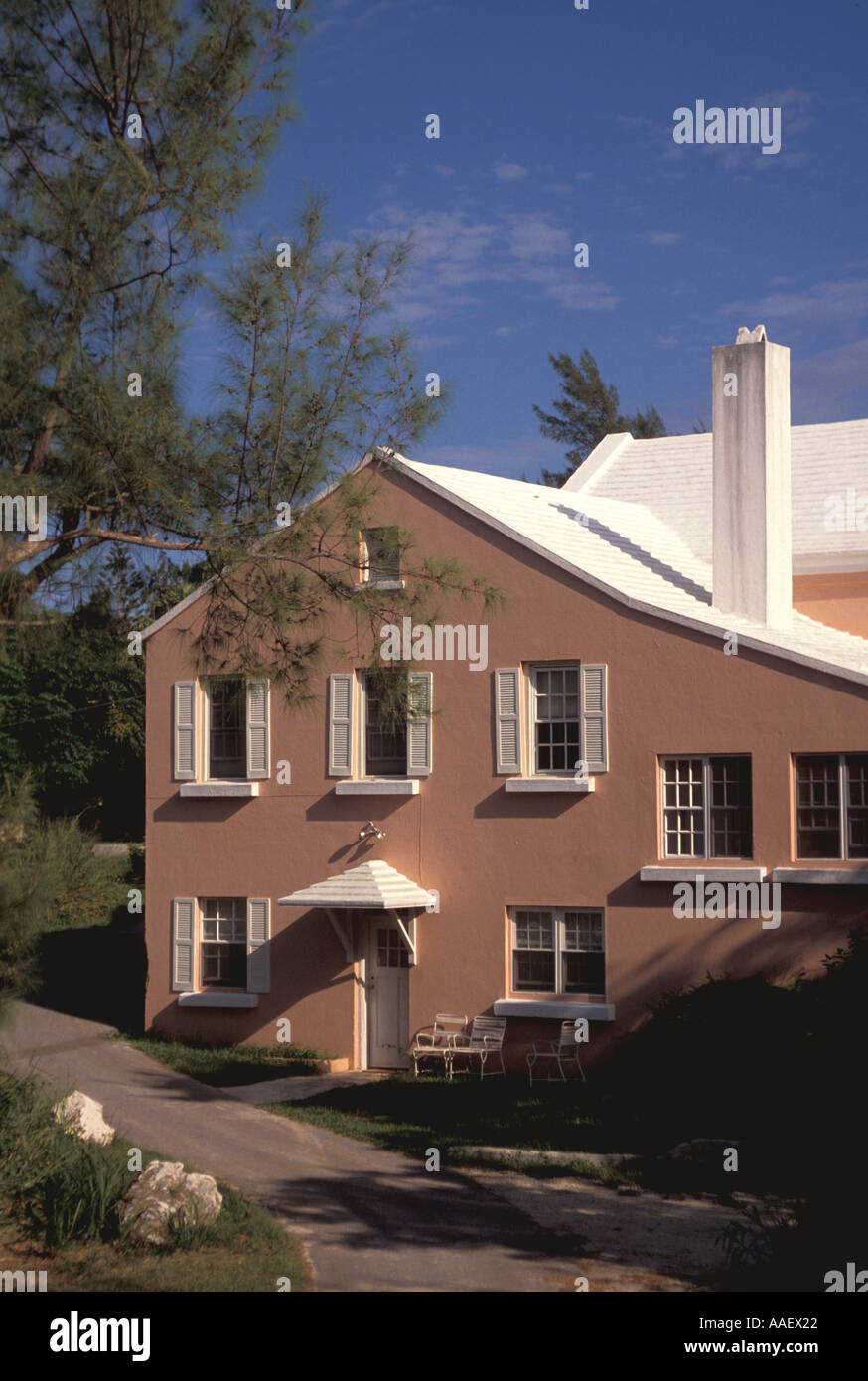 Bermuda Architecture White Roof Chimney Pink building symbol pine trees ...