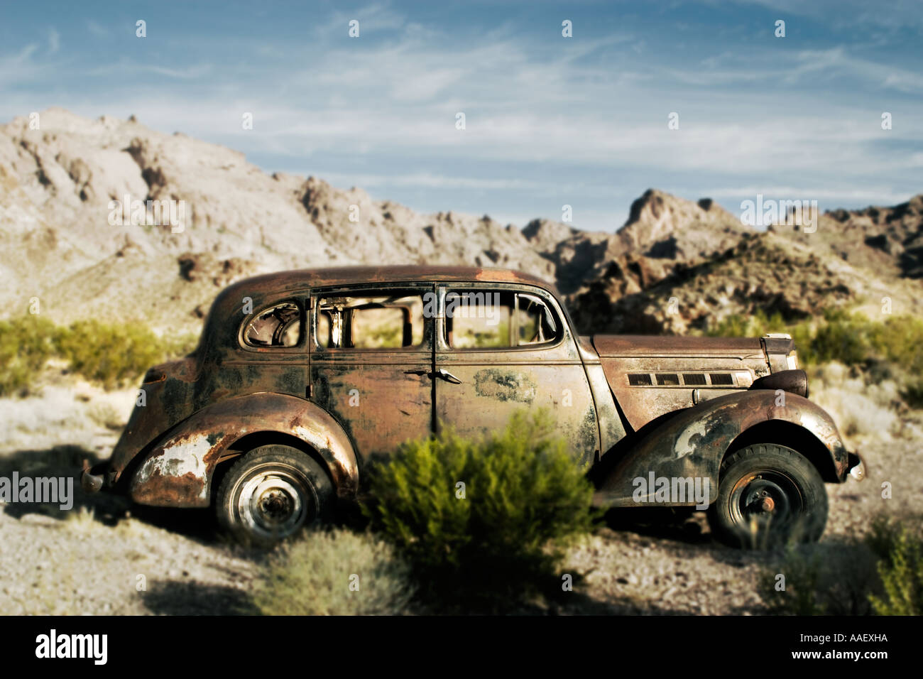 rustic car in desert, old Packard abondoned Stock Photo - Alamy