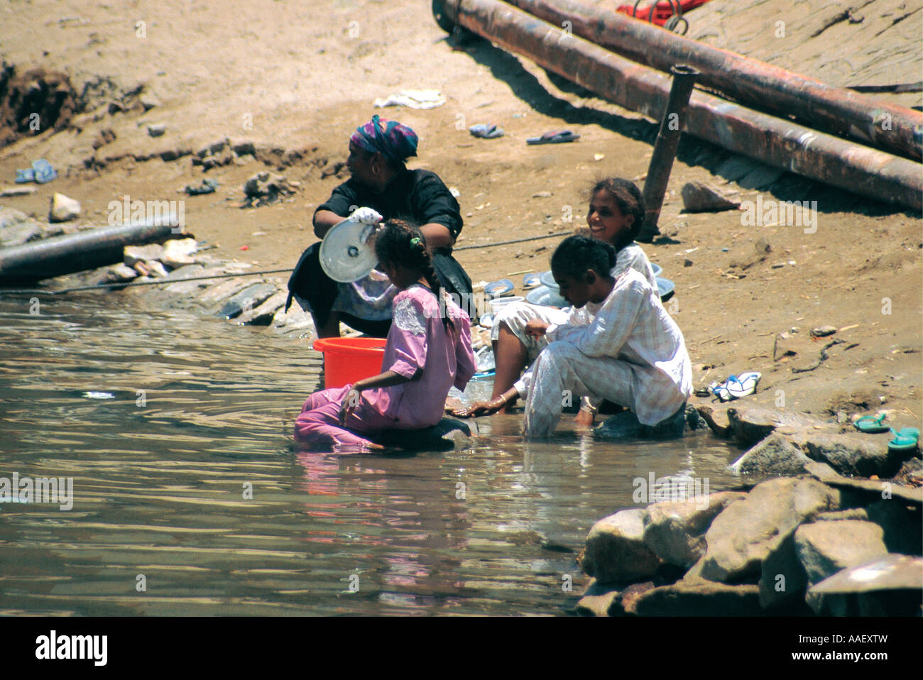 Family egypt washing hi-res stock photography and images - Alamy