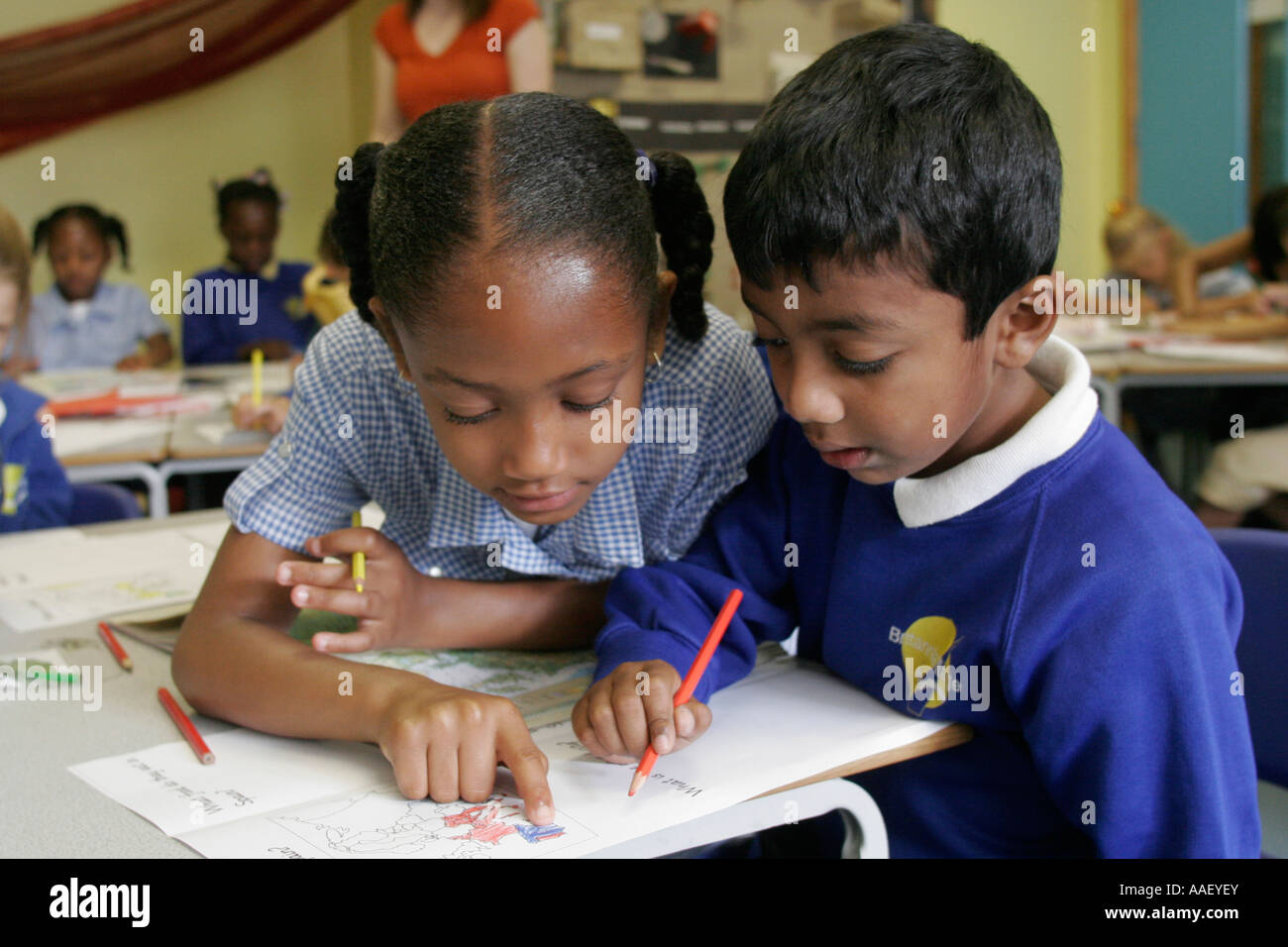 Two Primary school children in school lesson Stock Photo - Alamy