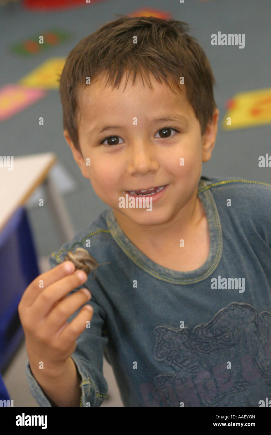 Primary school boy smiling to camera Stock Photo - Alamy