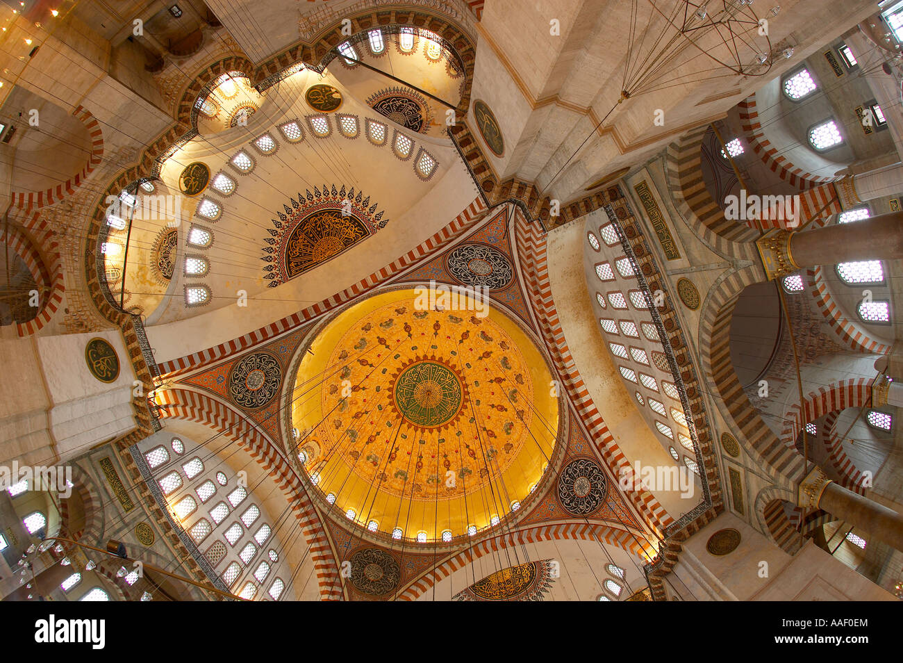 the interior of Suleymaniye Mosque looking staright up at the dome ...