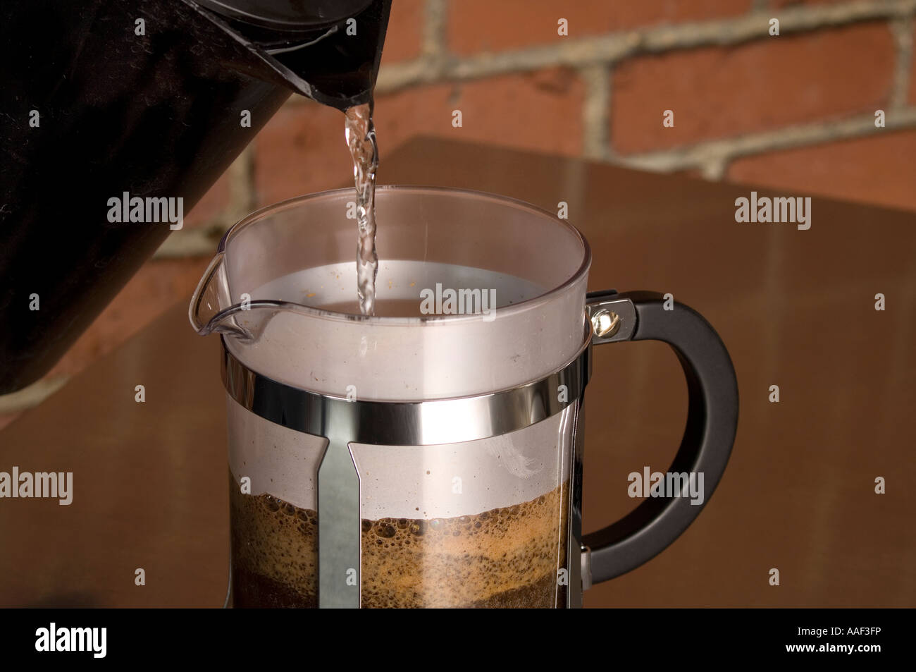 Adding the water hi-res stock photography and images - Alamy