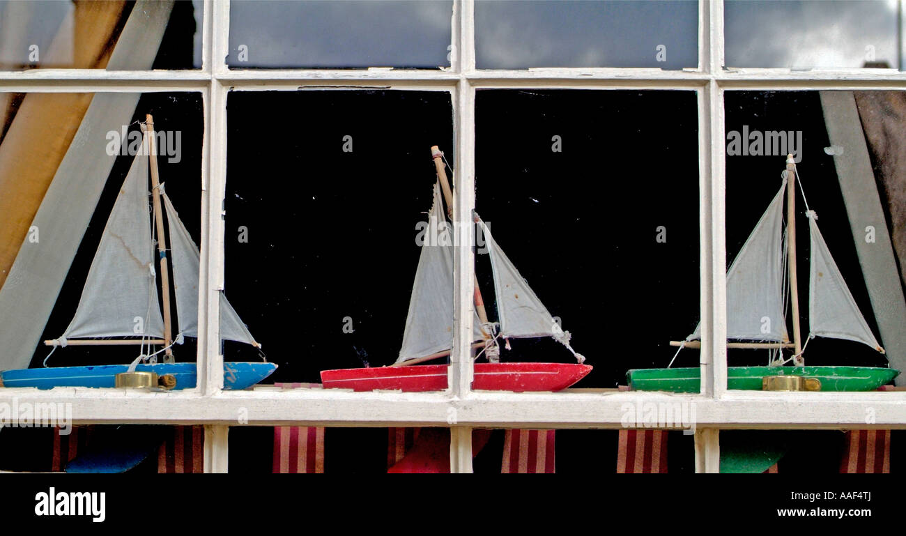 toy sail boat in window Stock Photo - Alamy