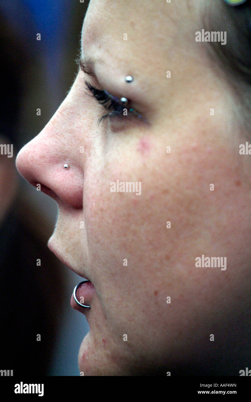 Nose piercing gold ring hi-res stock photography and images - Alamy