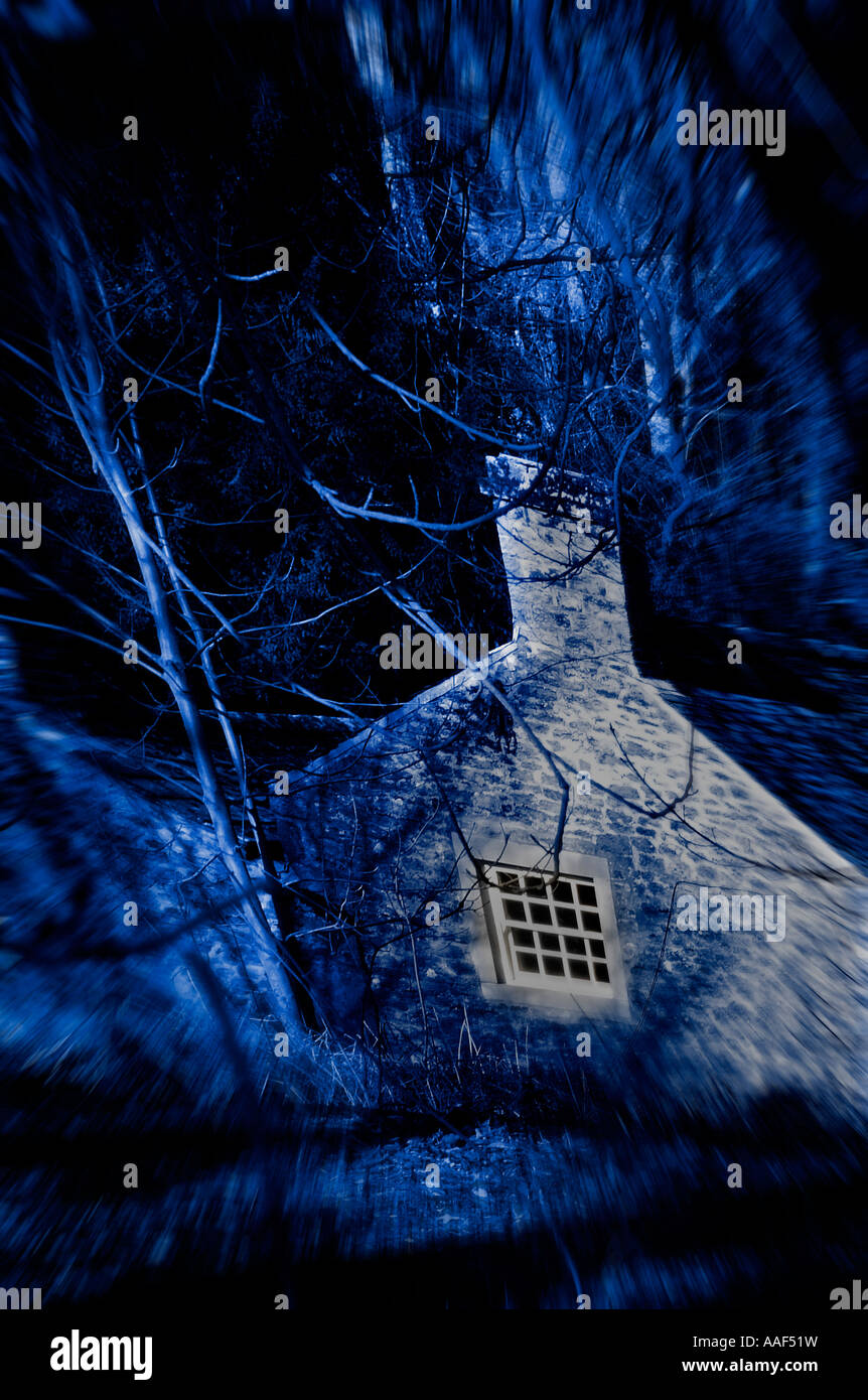 ghostly blue lit house Stock Photo - Alamy