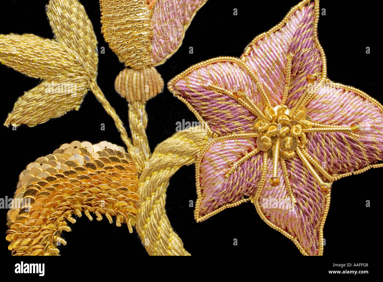 detail of embroidery with thread of gold Stock Photo - Alamy