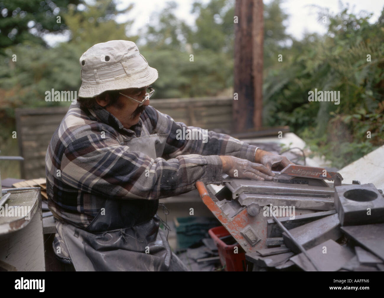 senior crafts man at work Stock Photo - Alamy
