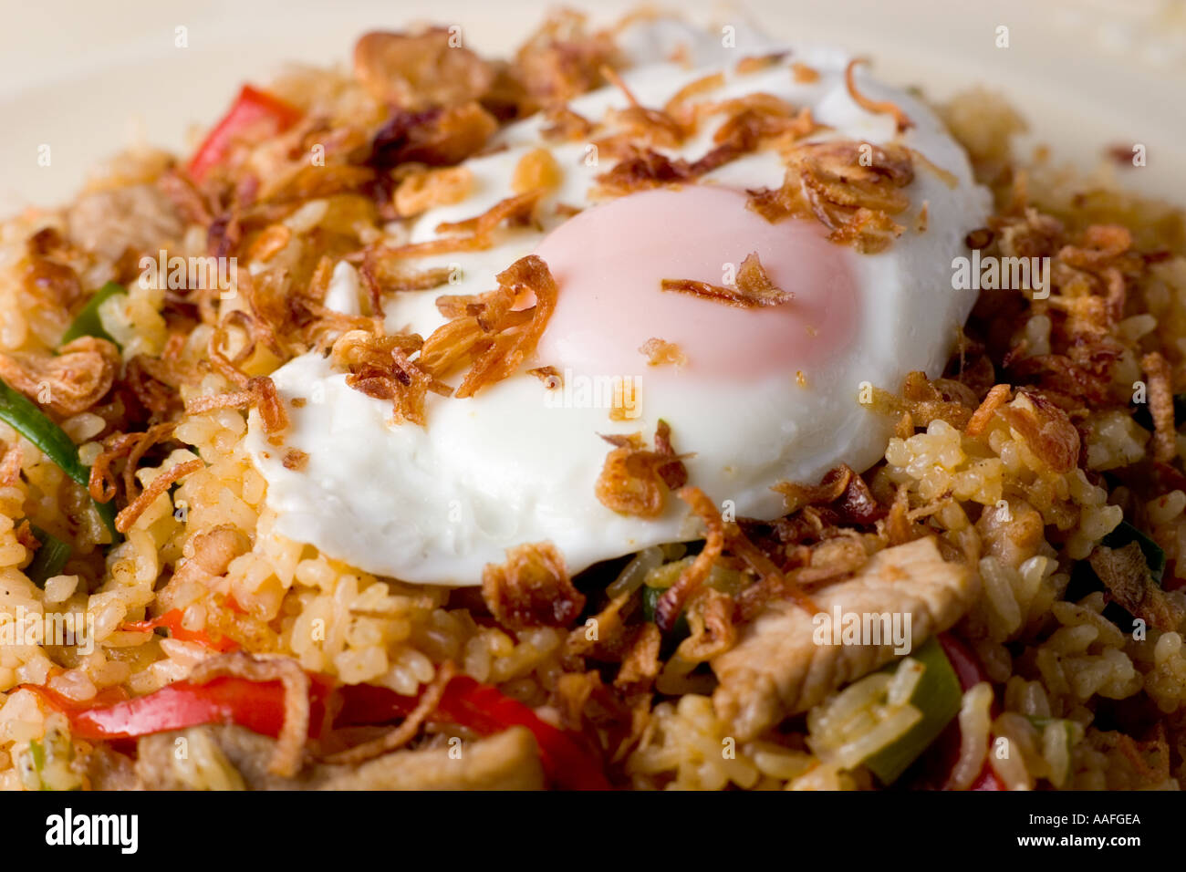Indonesian fried rice with fried egg hi-res stock photography and ...