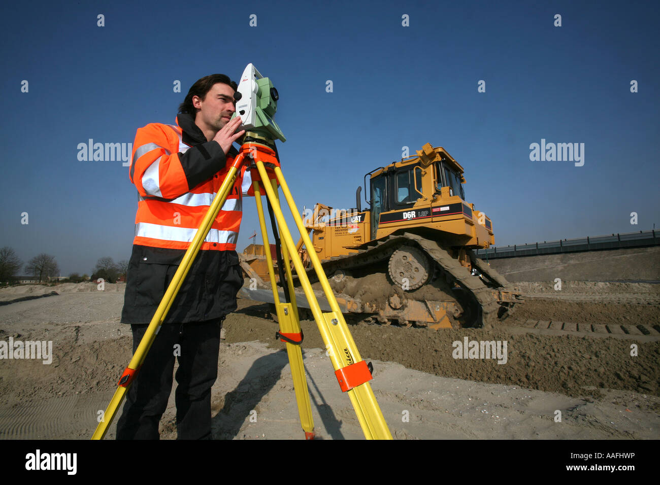 Surveyor at work He registers the borders of land properties editorial ...