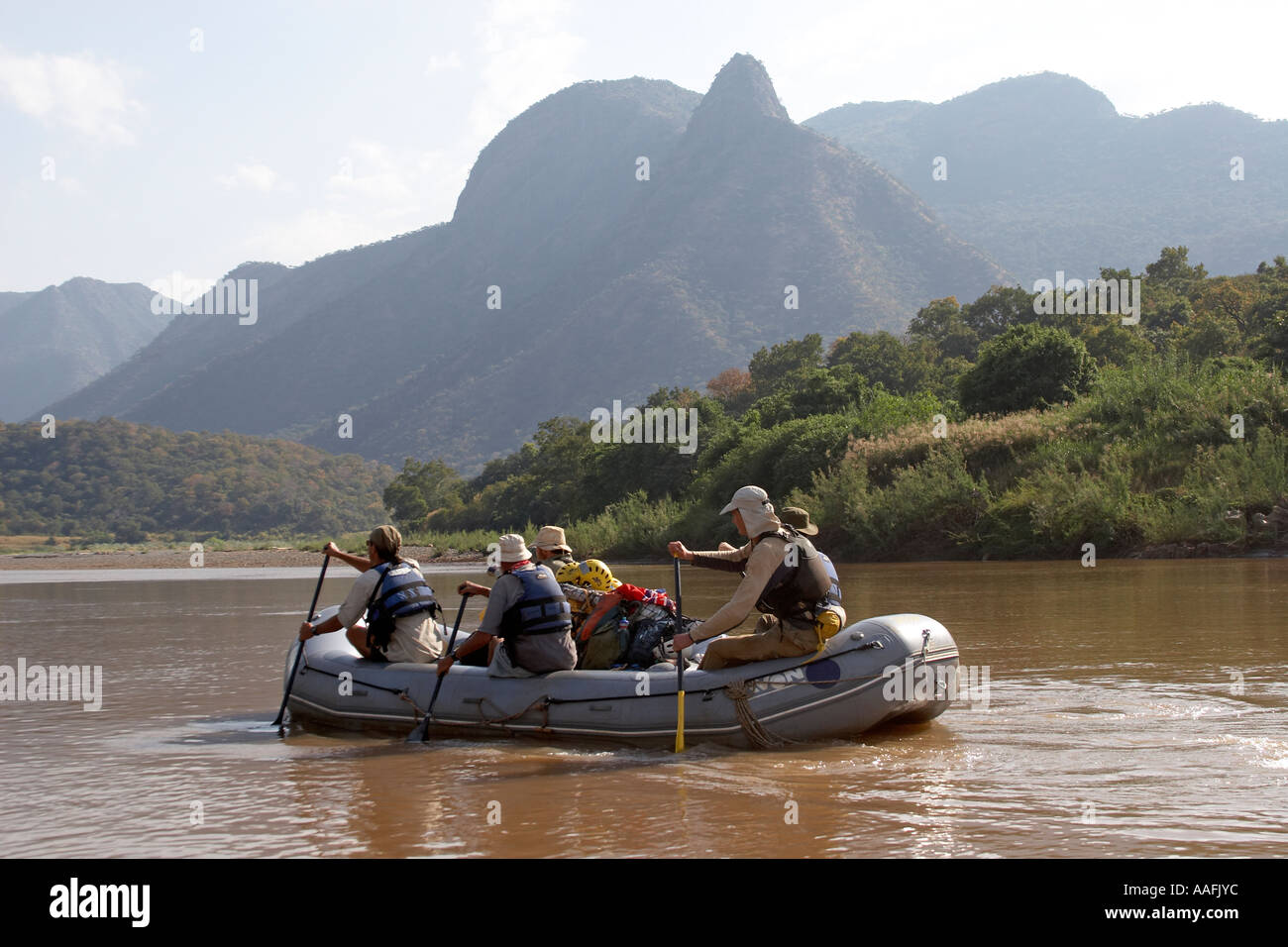 People white water rafting on Blue Nile river with mountains Stock ...