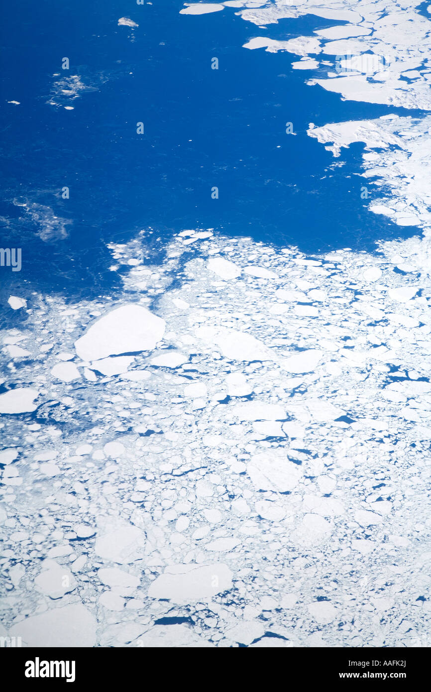 Aerial view of sea snow and frozen pack ice above Newfoundland in ...