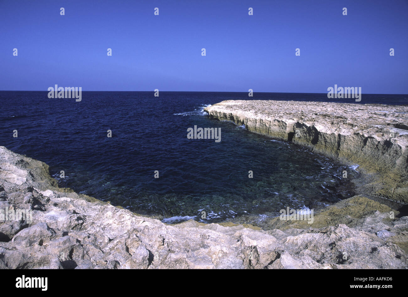 Washing machine Xwieni bay Gozo Stock Photo - Alamy