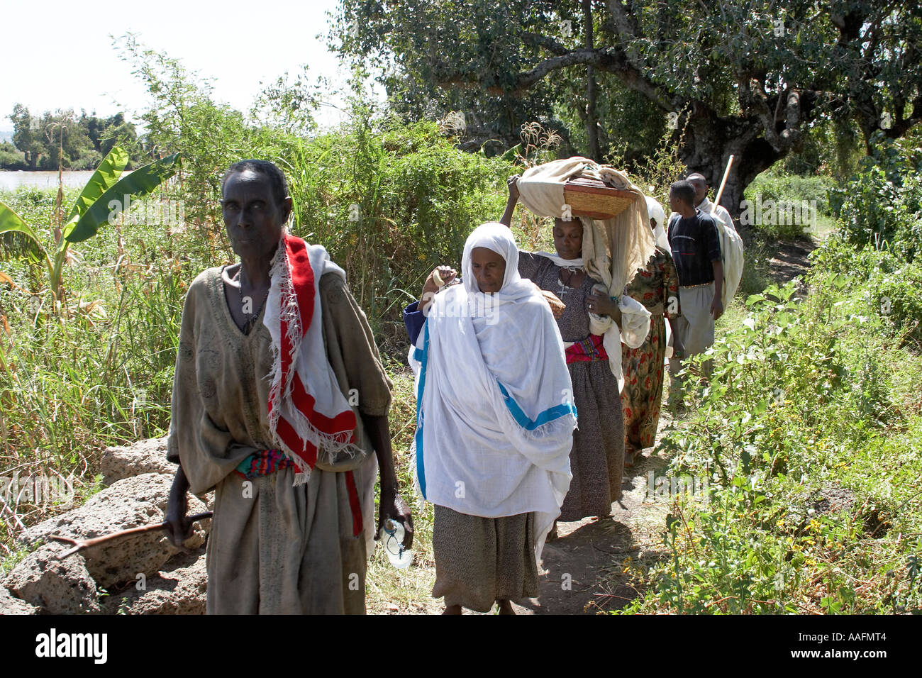 Pilgrims walking to Debre Maryam or Mariam church on Lake Tana near ...