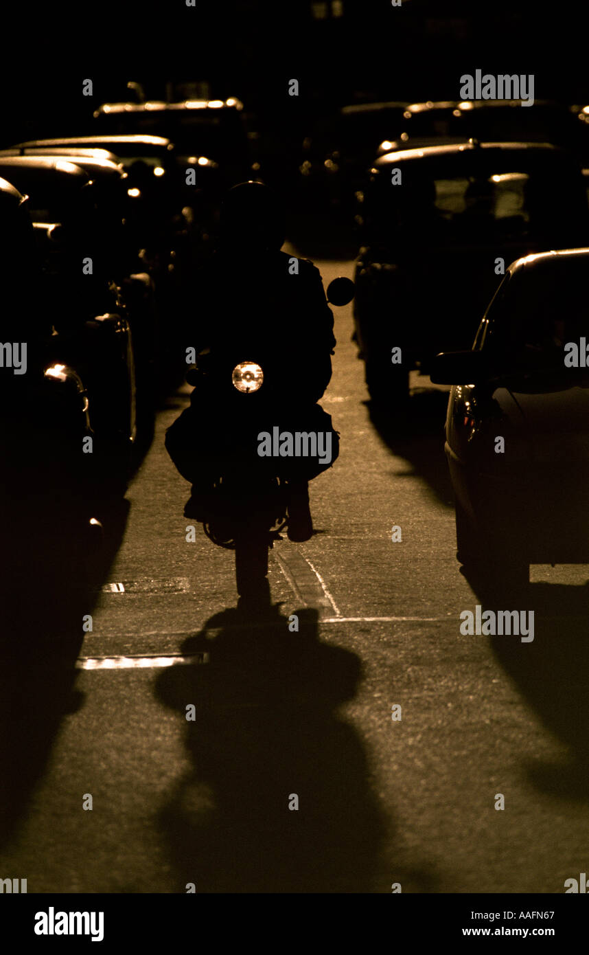 A motor cycle in rush hour near pica dilly circus in London uk Stock ...