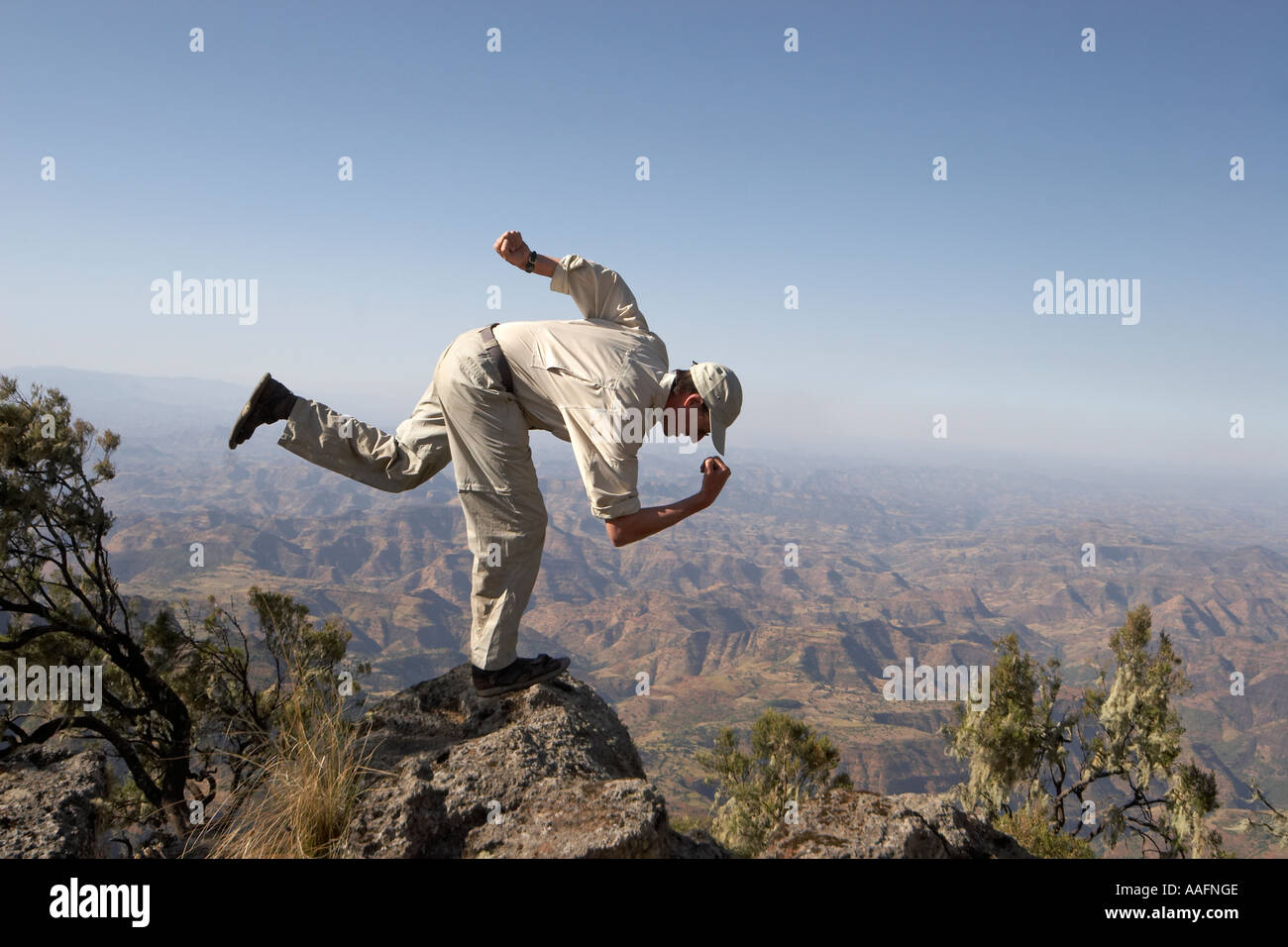 Andrew Holt photographer adopting daft thinker pose in Simien Mountains ...