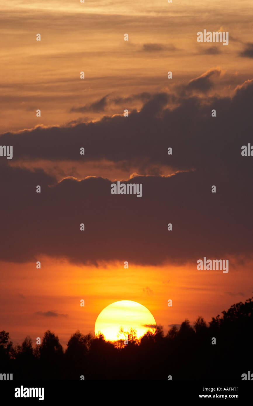 Sun setting in dramatic orange sunset in Entoto hills above Addis Ababa ...