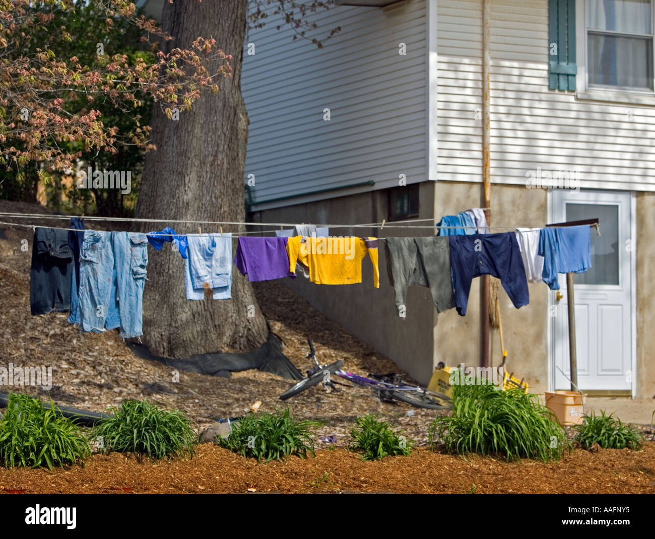 Clothing drying on a clothesline Stock Photo - Alamy