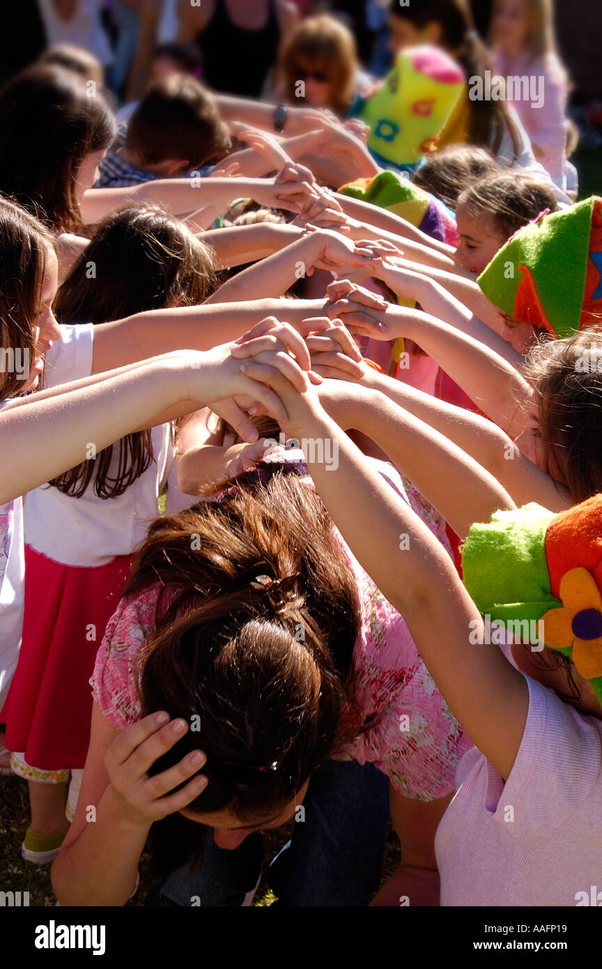 Tunnel of hands Stock Photo - Alamy