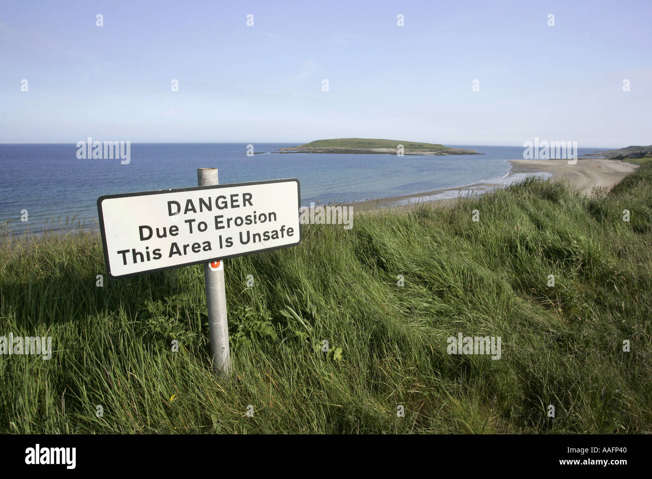 Cliff erosion warning signs overlooking Ballyhornan beach and gunns ...