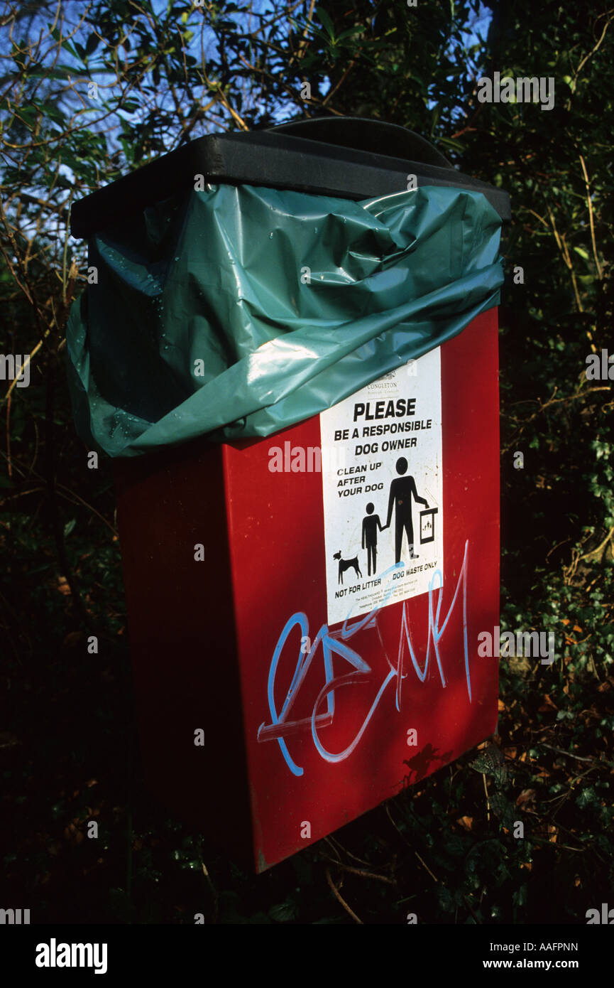 Dog Waste Bin With Graffiti Stock Photo - Alamy