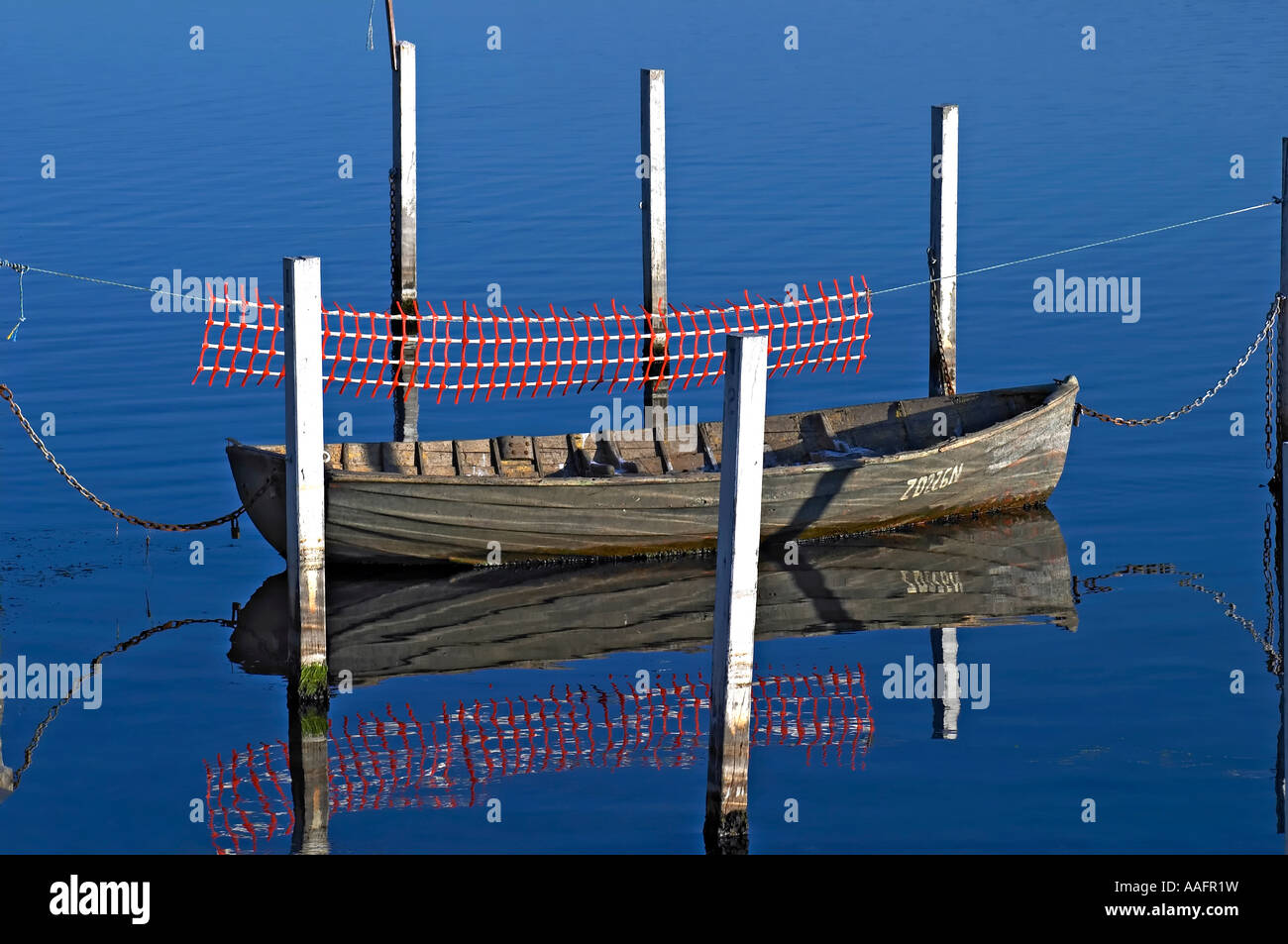 Moored Timber Dinghy Stock Photo - Alamy