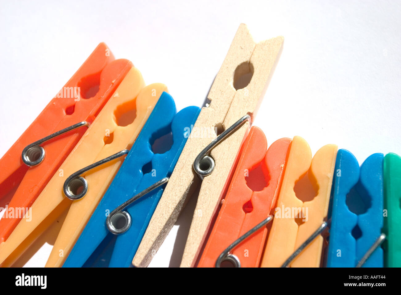 group of pegs with one different and all the group similar Stock Photo ...