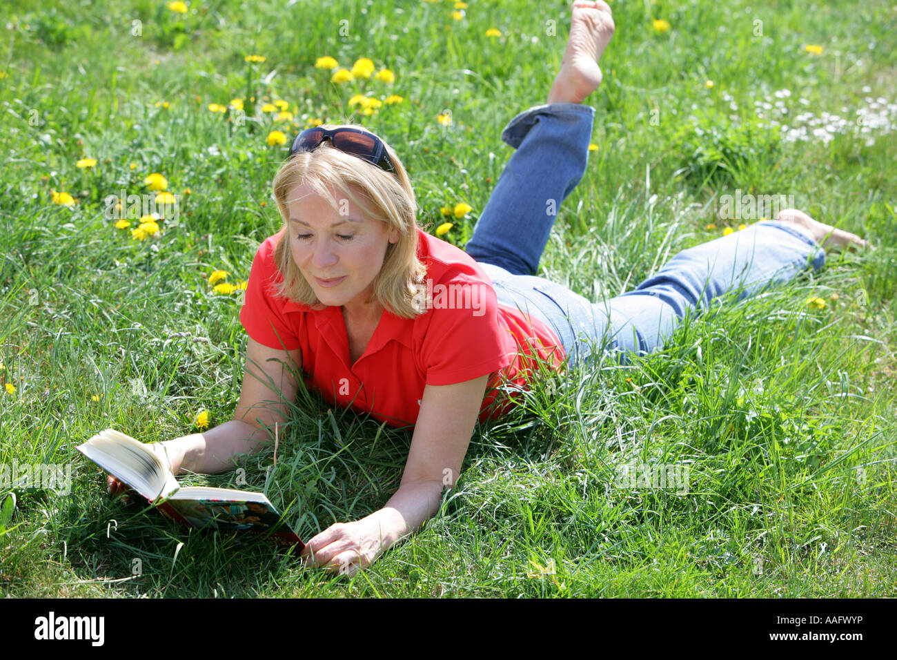 Woman Reading A Book Outside