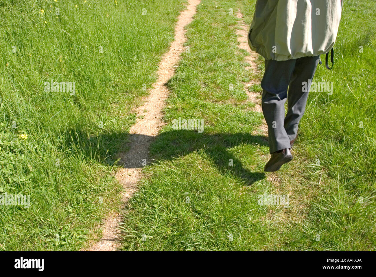 Male tourist taking beach walk hi-res stock photography and images - Alamy