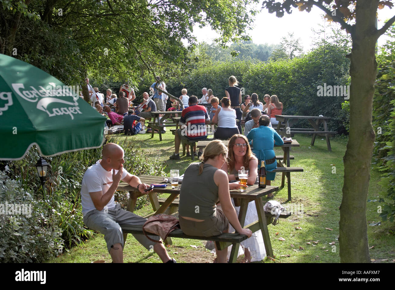 The Farmer s Boy pub beer garden with people eating on a summer ...