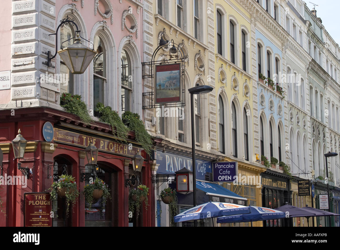 Museum Street with Georgian architecture shops and The Plough pub ...