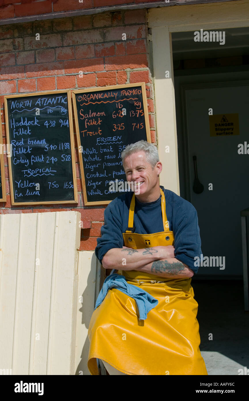 Nigel Sayers fish merchant waits for customers on Brighton beach Stock ...