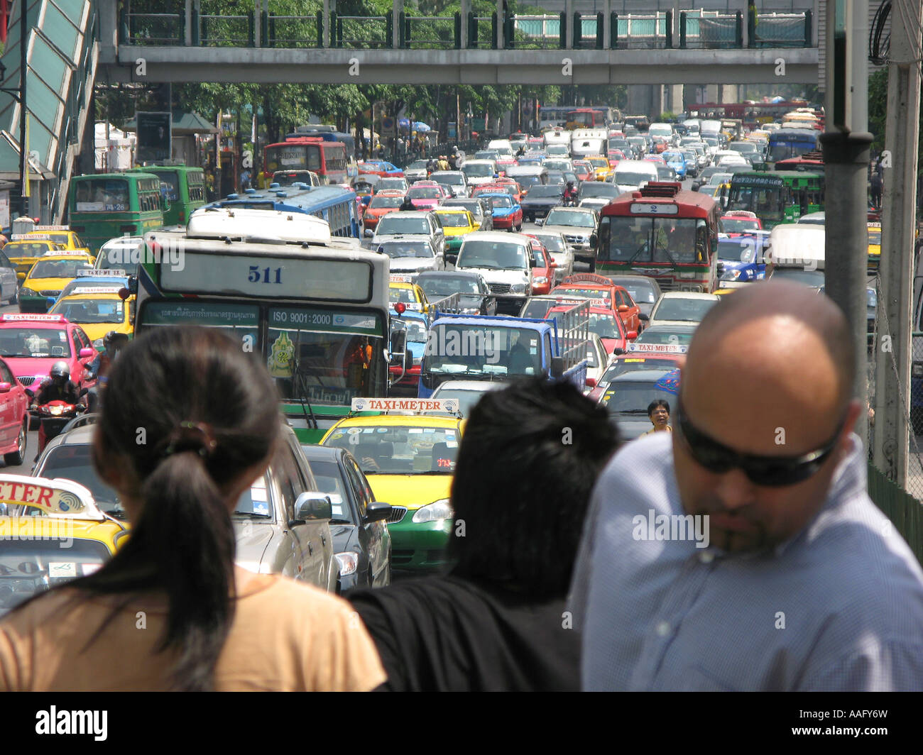 pedestrians in the hot congested gridlocked rush hour traffic in ...