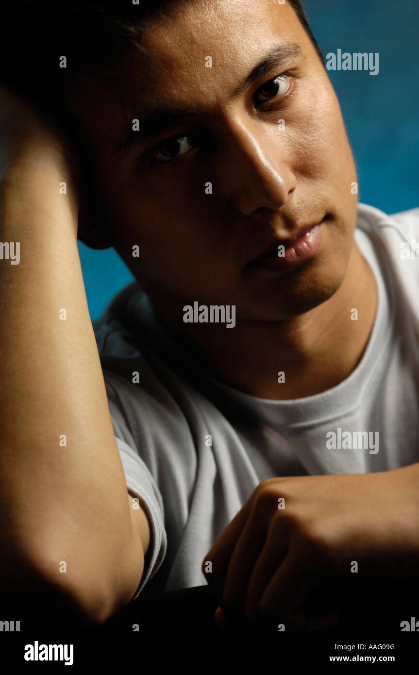Young asian man expressive portrait Stock Photo - Alamy