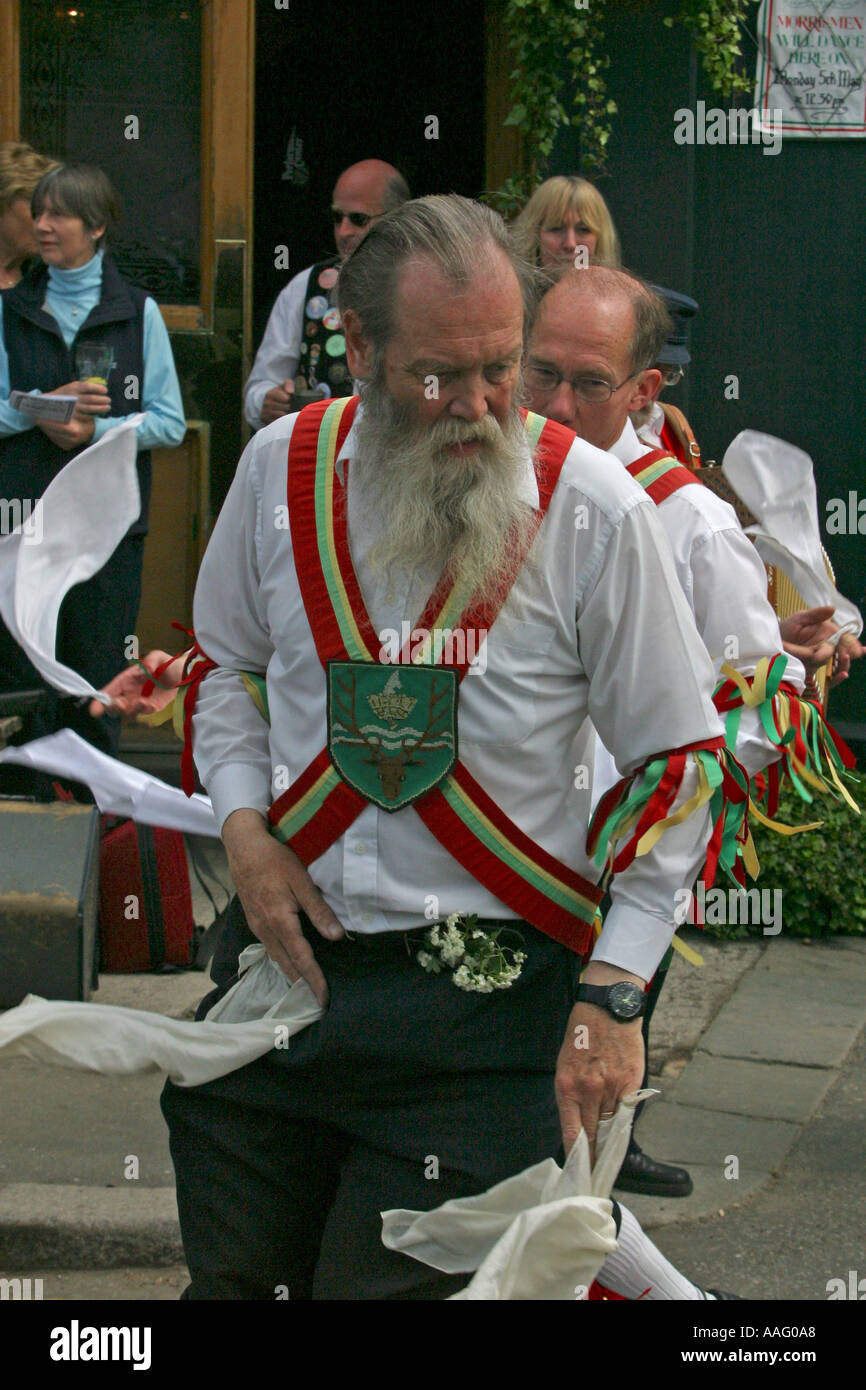 Morris men musicians visit village pub Stock Photo - Alamy
