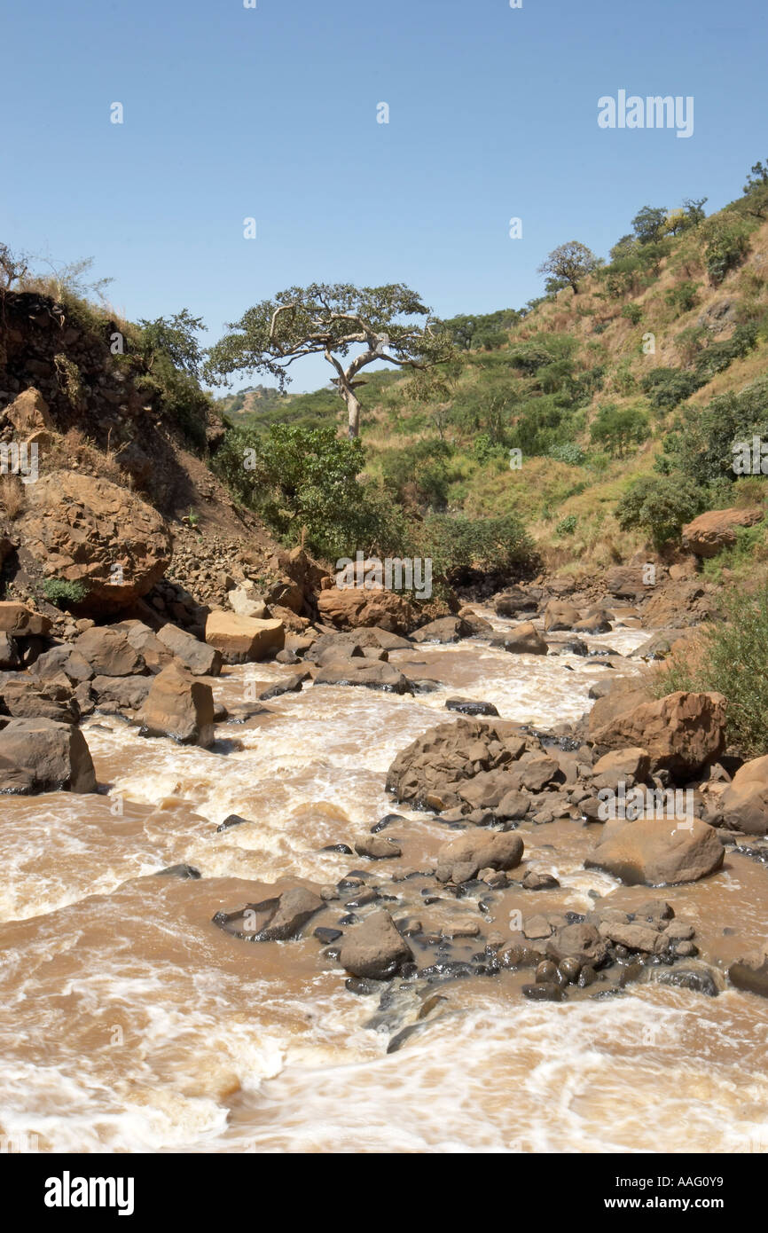 Rushing water torrents below waterfall in Fetan river valley below Kuch ...