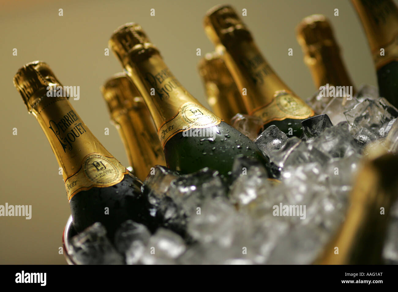 Champagne bottles in ice Stock Photo - Alamy