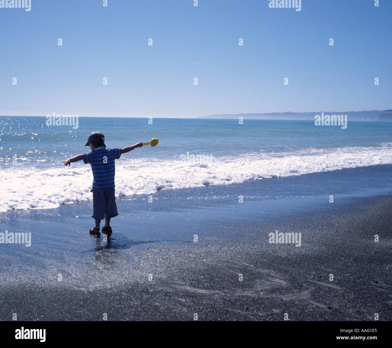 Boy arms out stretched hi-res stock photography and images - Alamy