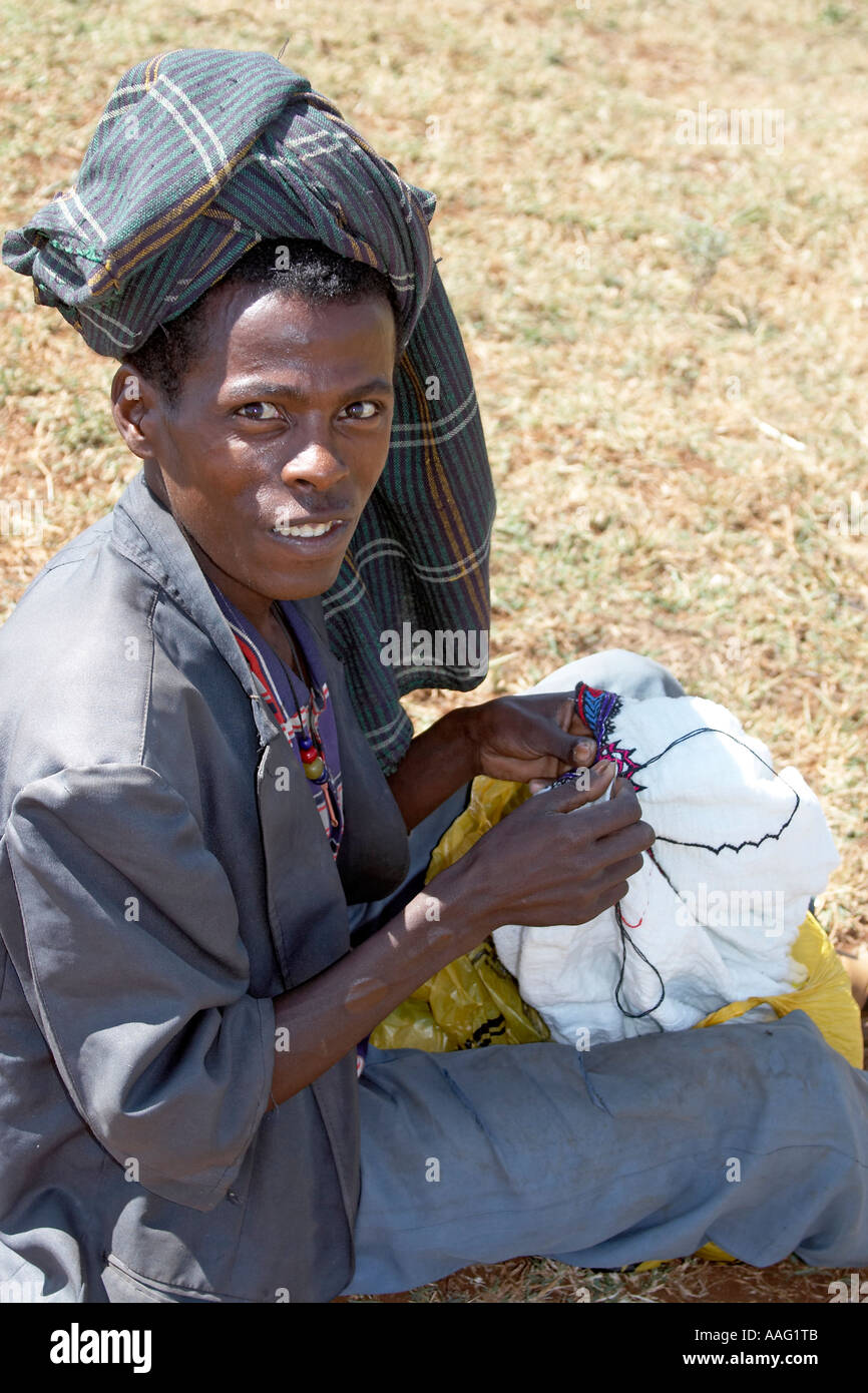 Man embroidering hi-res stock photography and images - Alamy