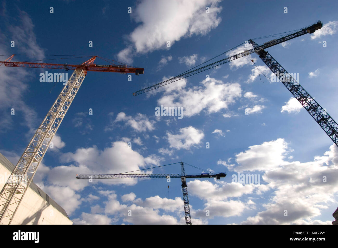Upward view of construction cranes at site of The Freedom Forum Newseum ...