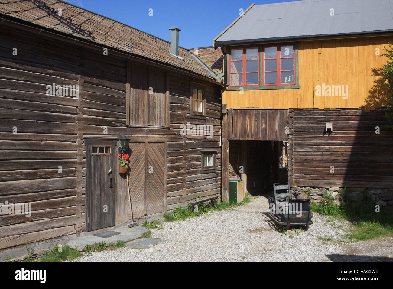 Courtyard with traditional timber buildings Roros Norway Stock Photo ...