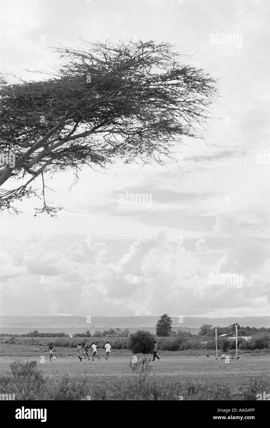 Children playing football in Kenya Africa Stock Photo - Alamy
