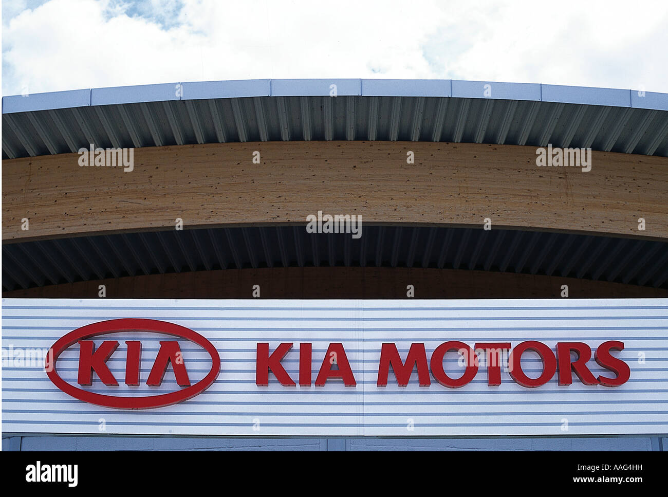 Red Kia Motors Logo and sign on a showroom Stock Photo - Alamy