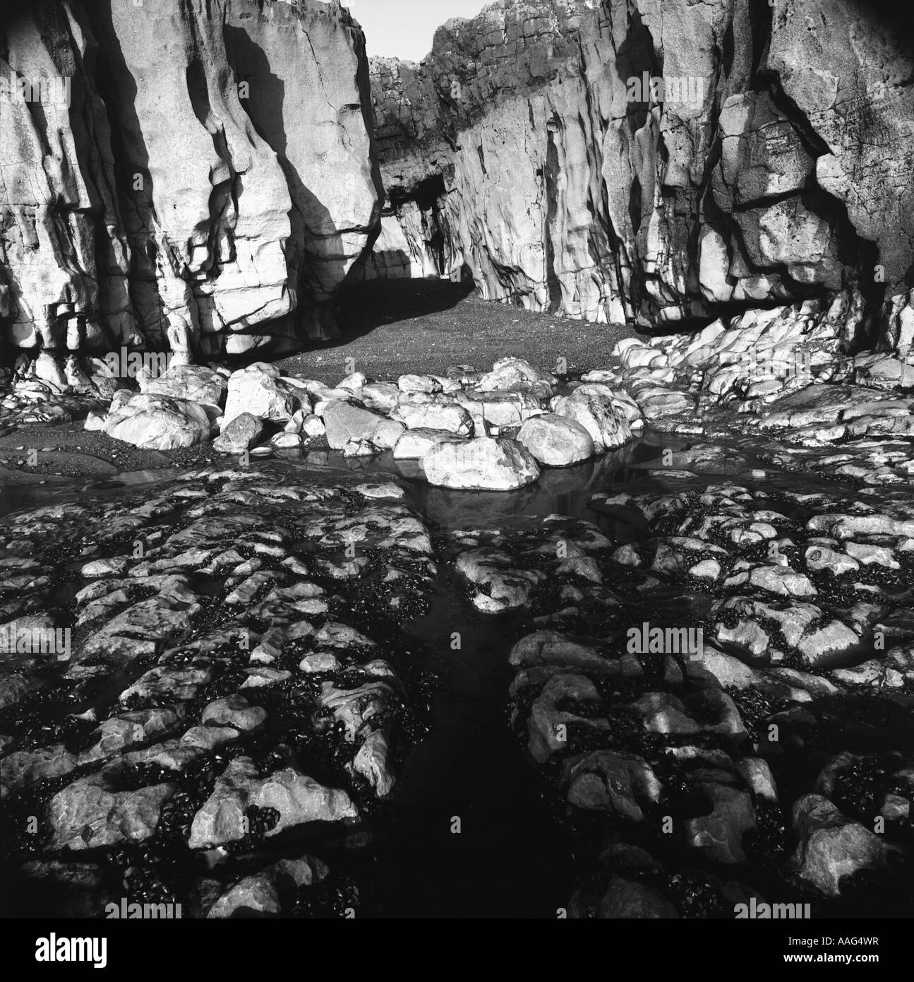 Faces in the rocks Stock Photo - Alamy